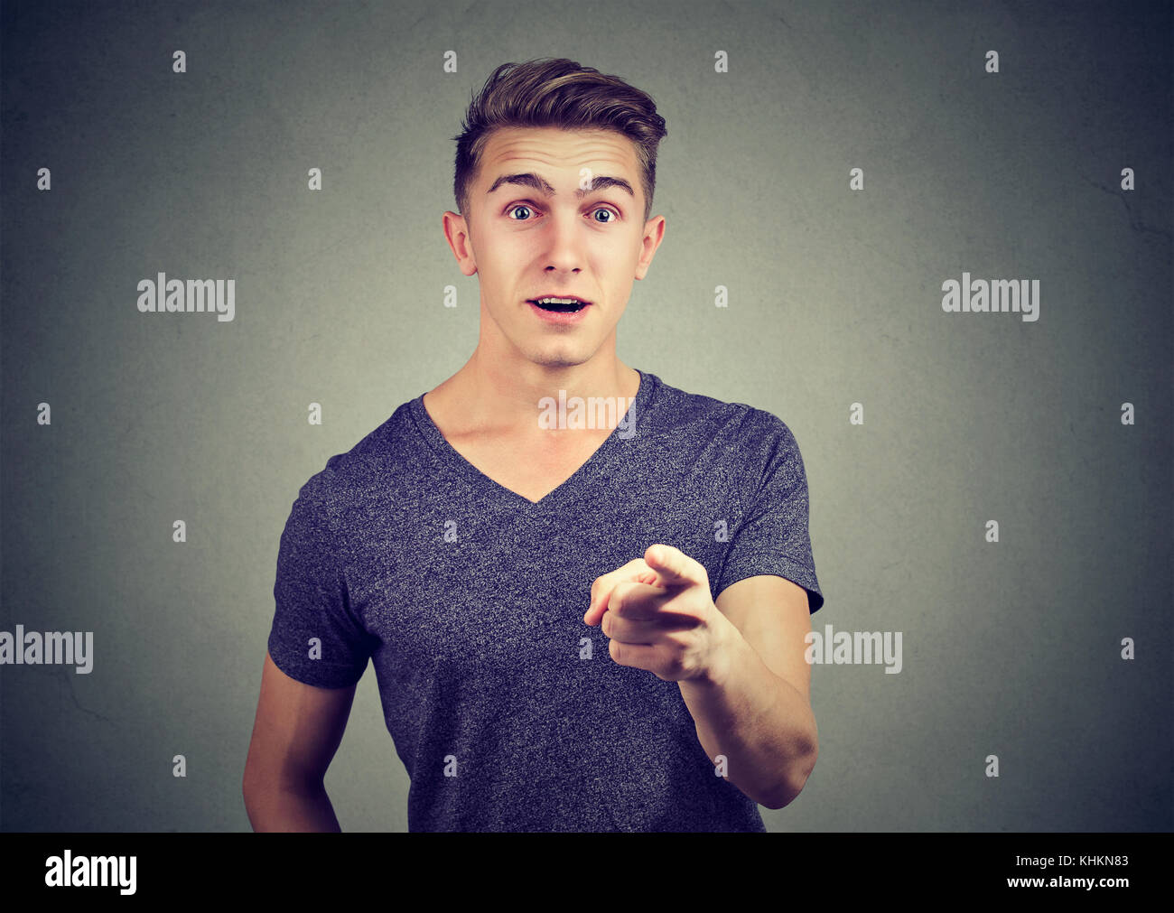 Handsome young man pointing at you hi-res stock photography and images ...