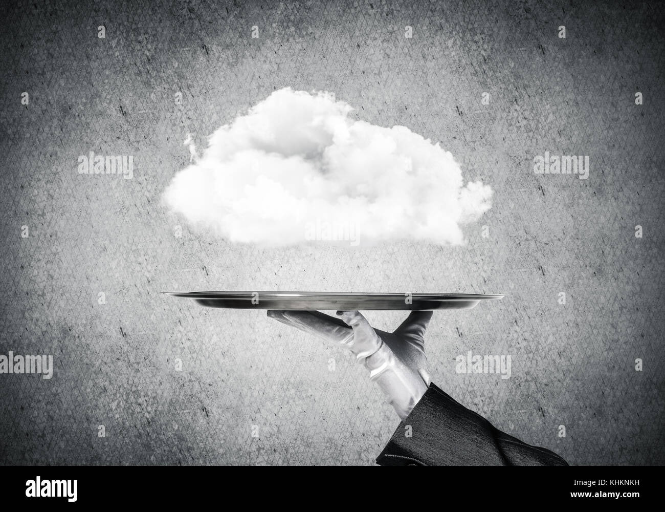 Hand of waitress presenting cloud on tray Stock Photo - Alamy
