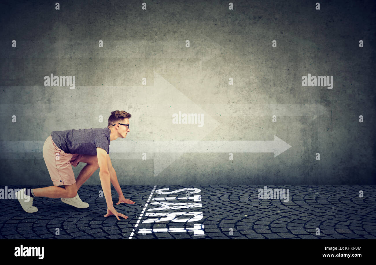 young man in the starting position Stock Photo - Alamy