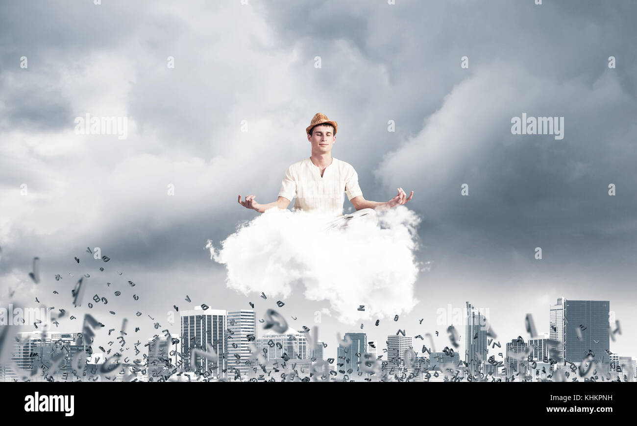 Young man keeping mind conscious Stock Photo - Alamy