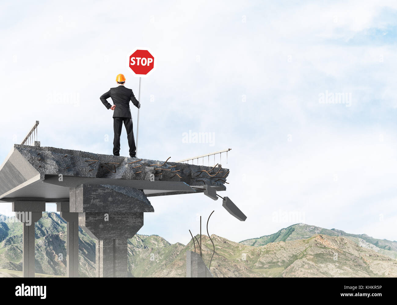 Confident engineer holding street safety sign Stock Photo - Alamy