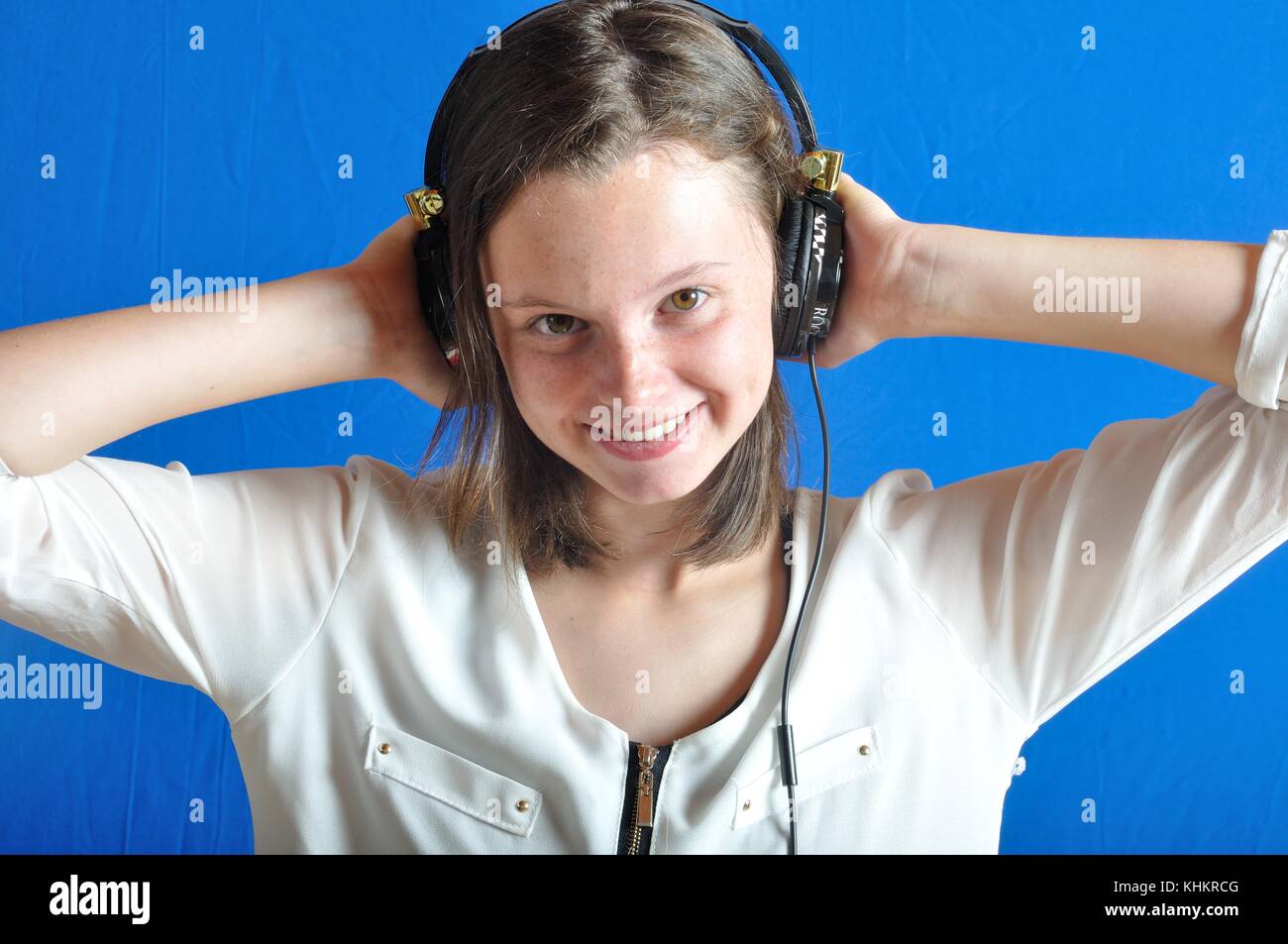 Teen listening to music Stock Photo - Alamy