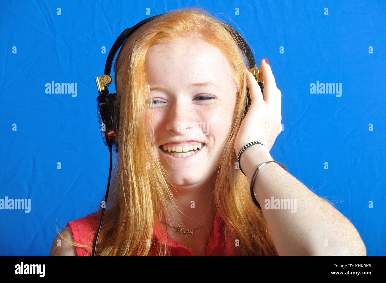 Teen listening to music Stock Photo - Alamy