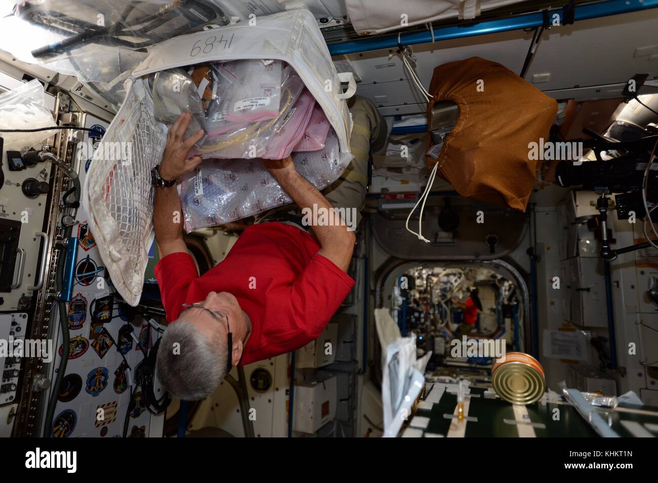 Expedition 53 Italian astronaut Paolo Nespoli works upside down on ...