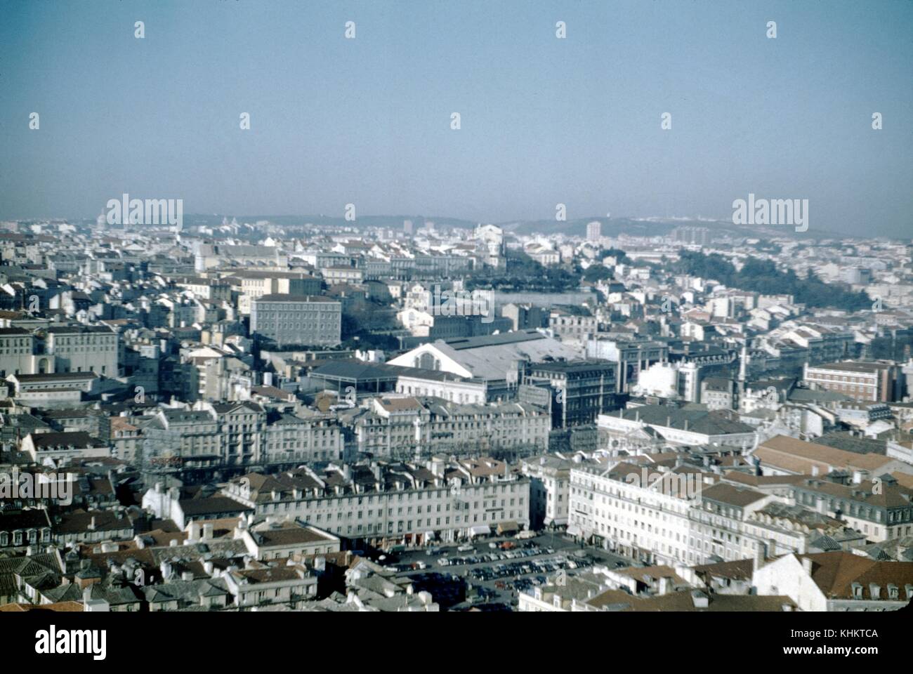 A photograph of an unnamed city, the sprawling city is densely packed ...
