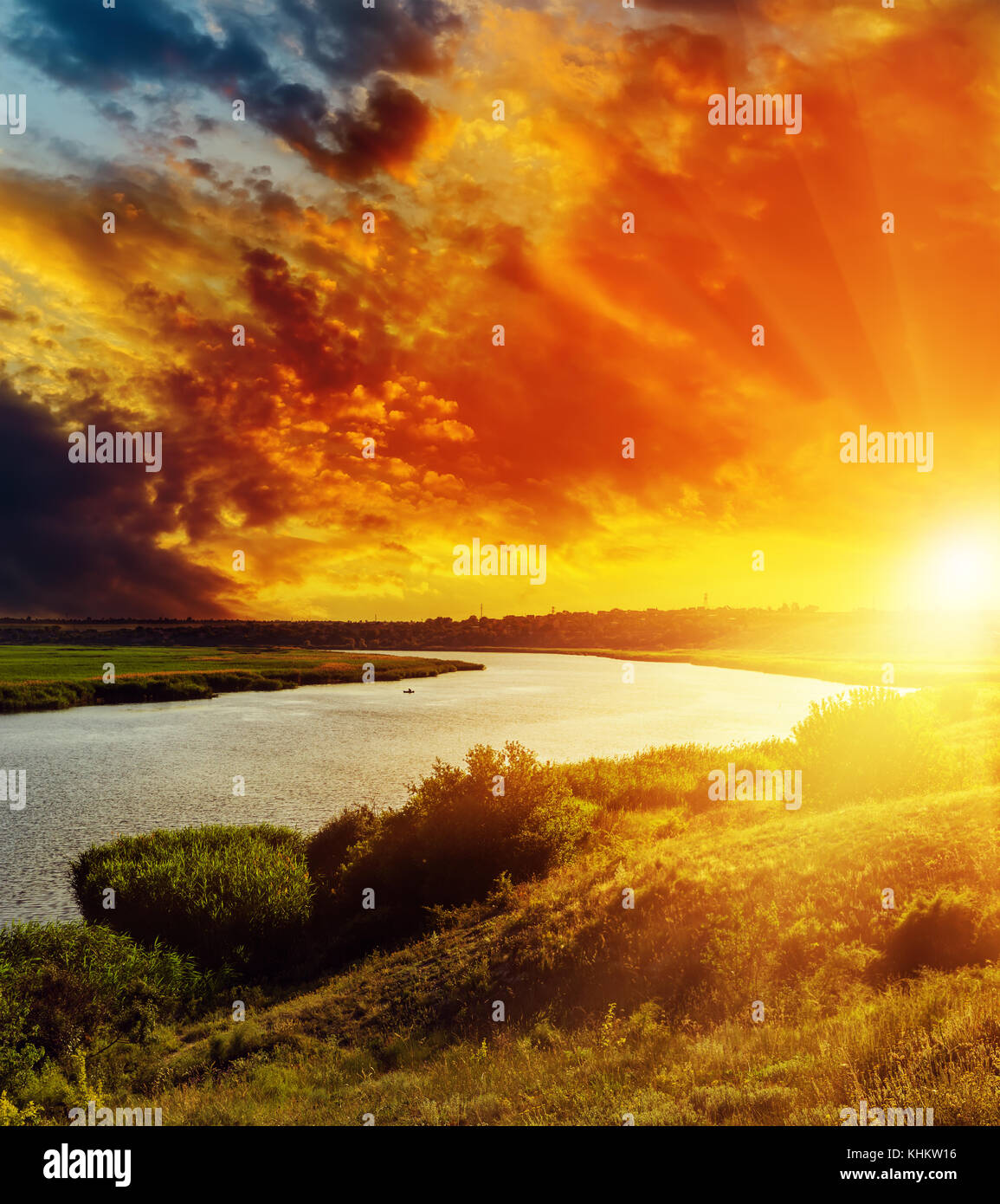 fantastic red sunset over river Stock Photo - Alamy