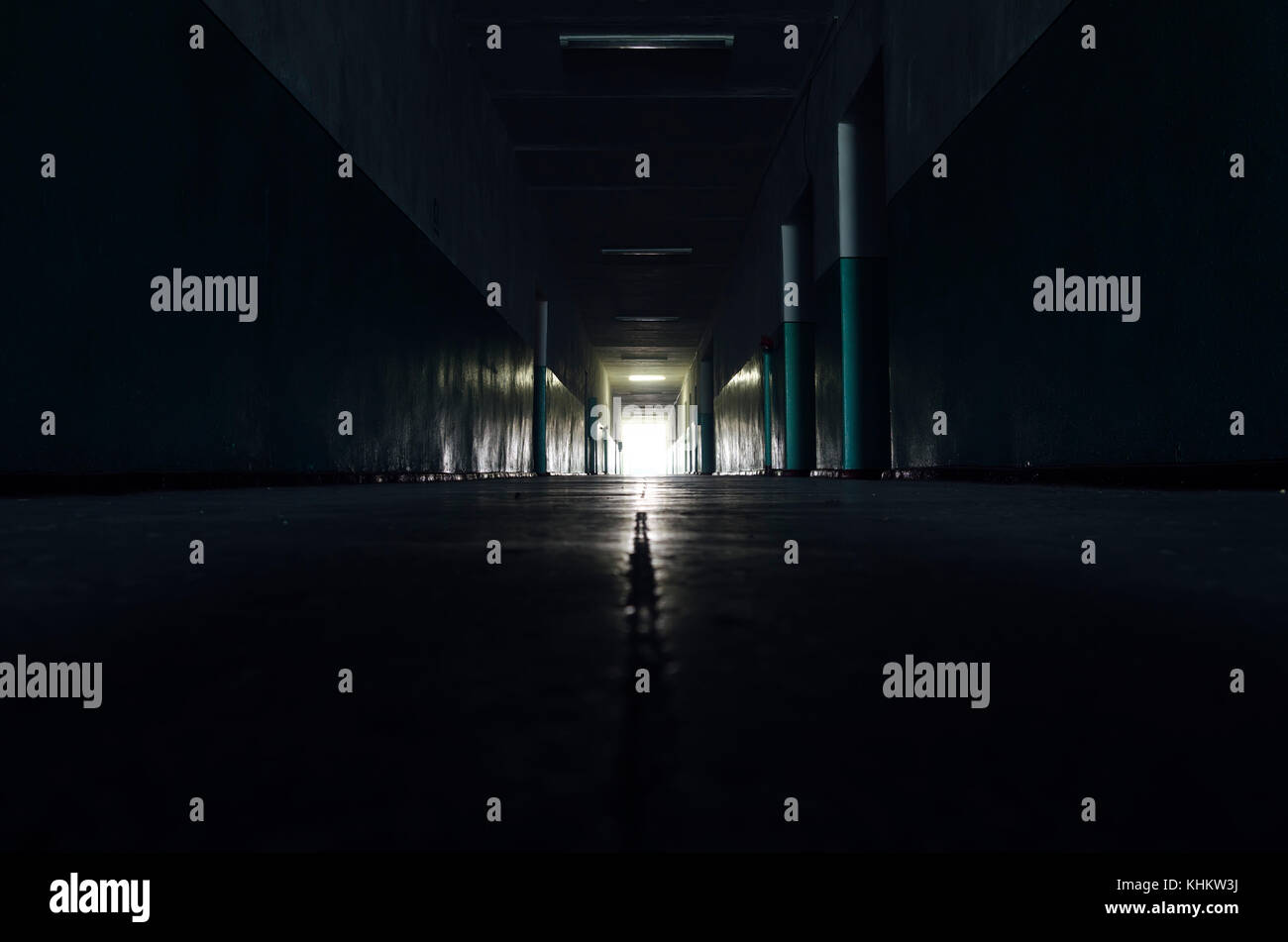 dark corridor with light in horizon Stock Photo - Alamy