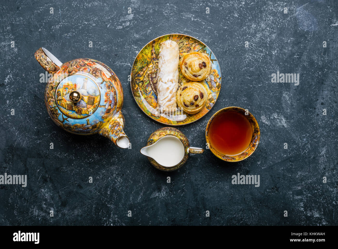 Tea set of oriental sweets bakery. Top view. Dark background Stock ...