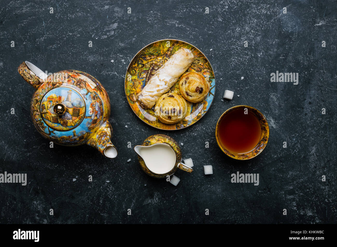 Tea set of oriental sweets bakery. Top view. Dark background Stock ...