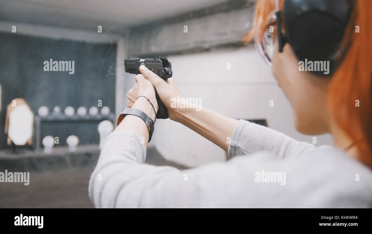 Female police detective with gun hi-res stock photography and images ...