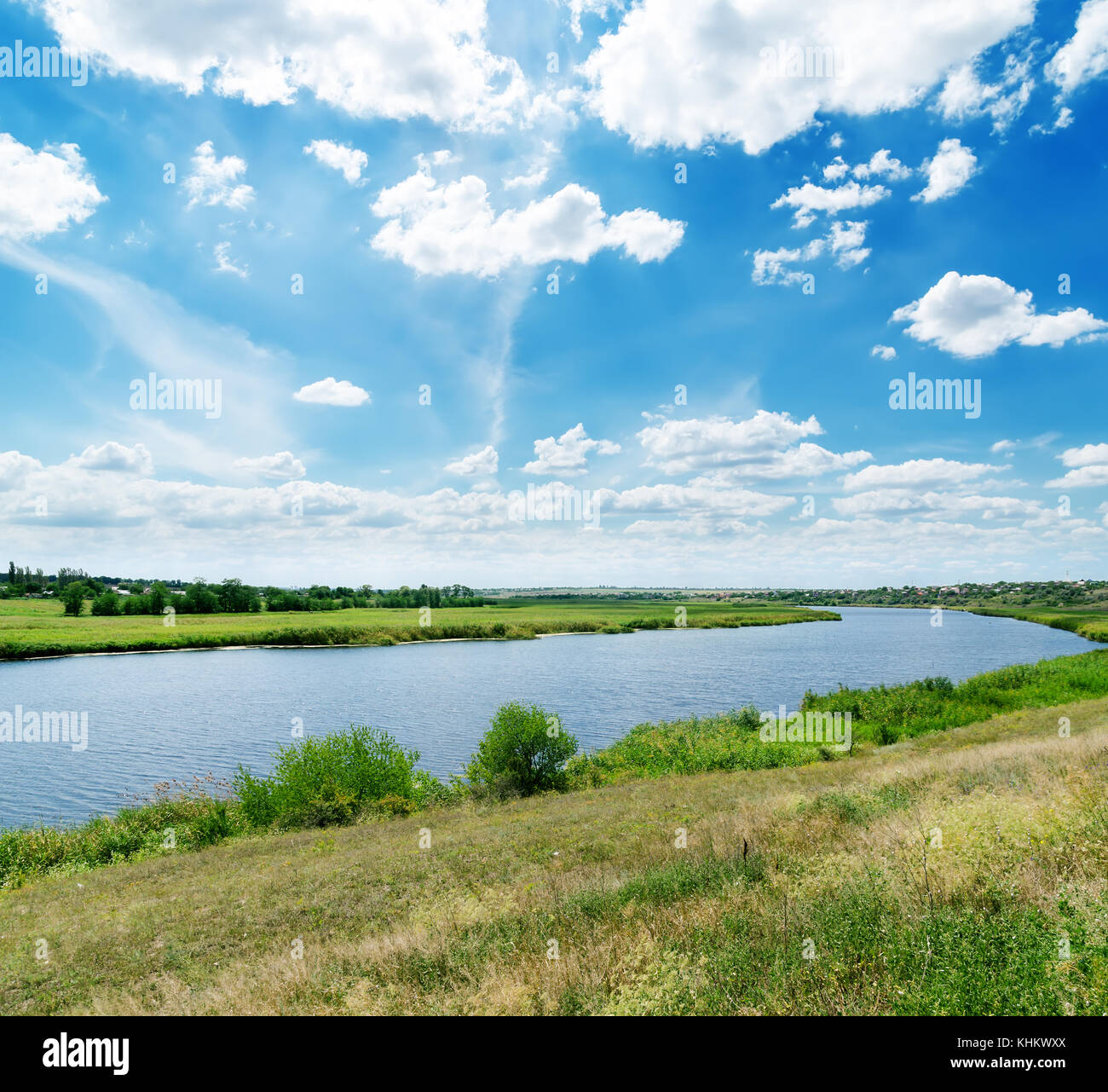 sunny sky with clouds over river Stock Photo - Alamy