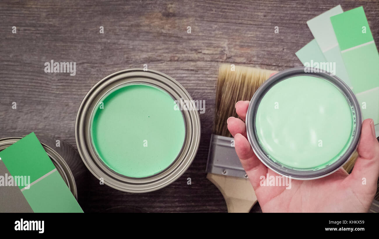 Home inprovement project. Painting wood with turquose color paint Stock ...