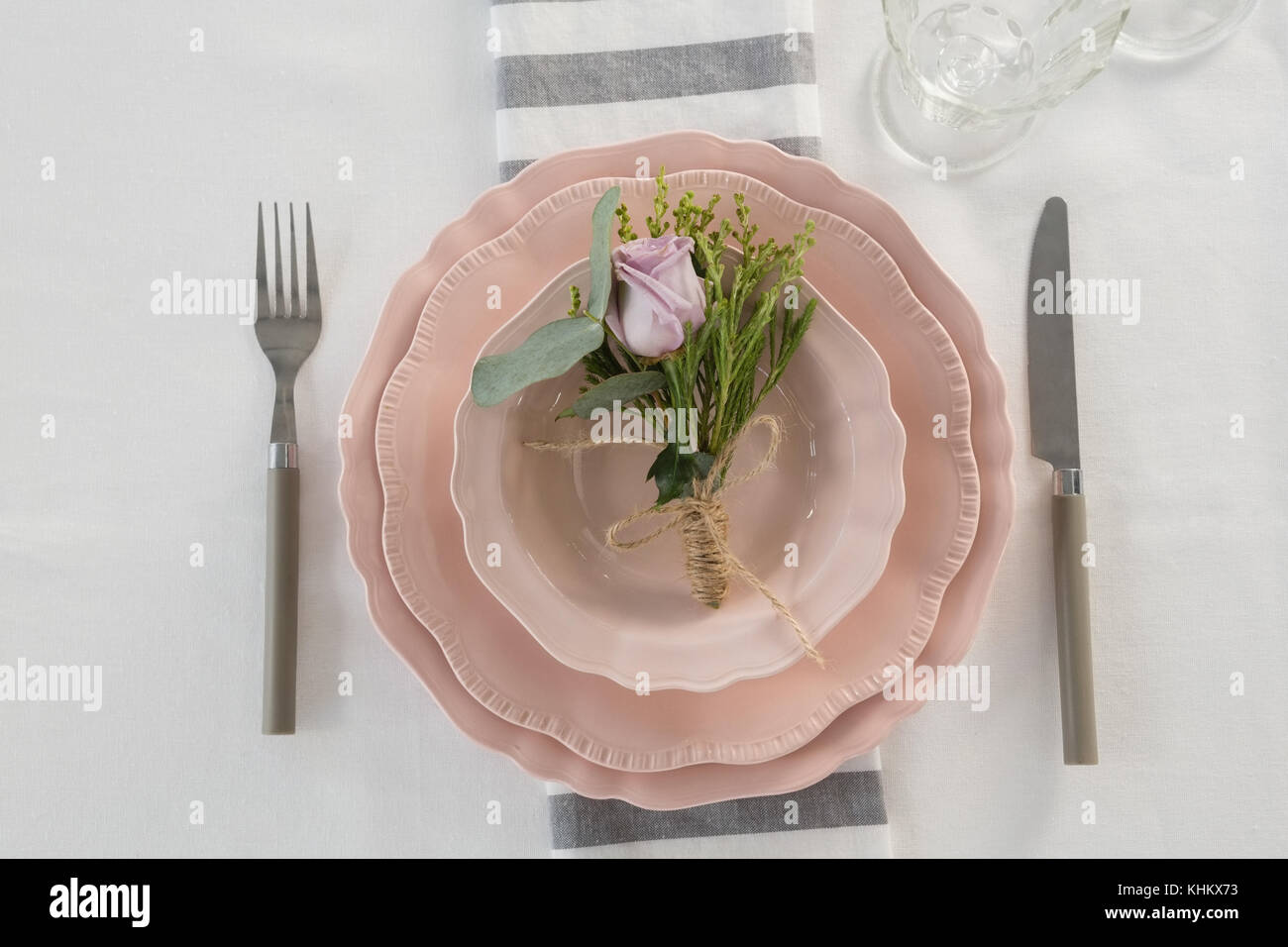 Overhead of table setting on white background Stock Photo - Alamy