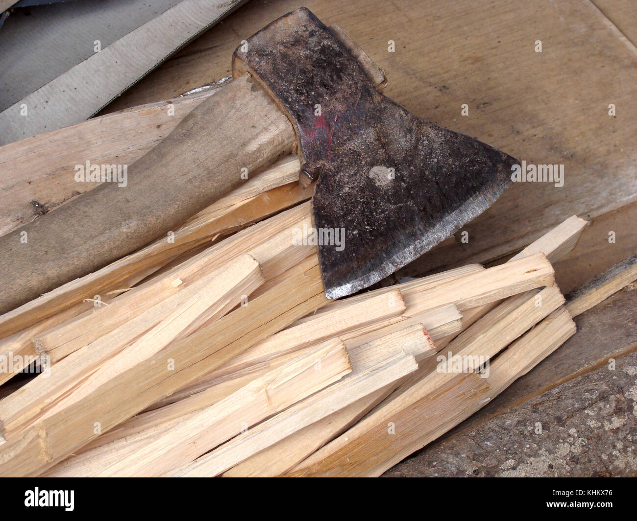 Bunch of kindling splints and an ax close up Stock Photo - Alamy