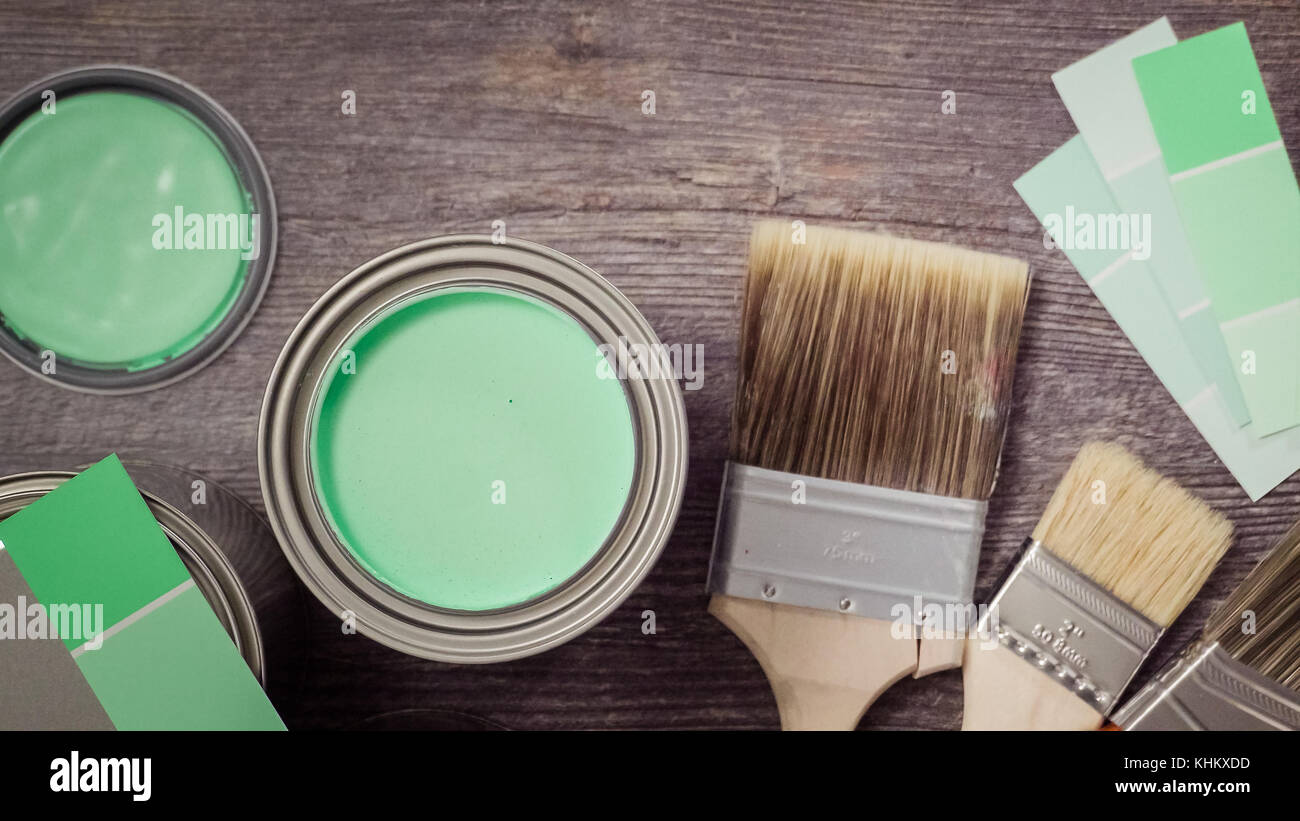 Home inprovement project. Painting wood with turquose color paint Stock ...