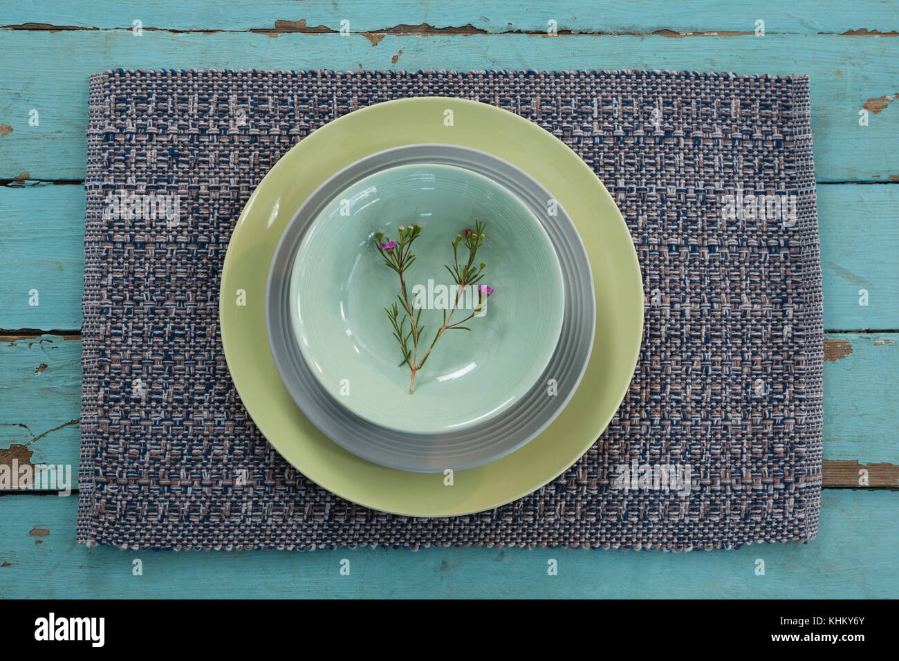 Overhead of table setting on weathered wooden plank Stock Photo - Alamy