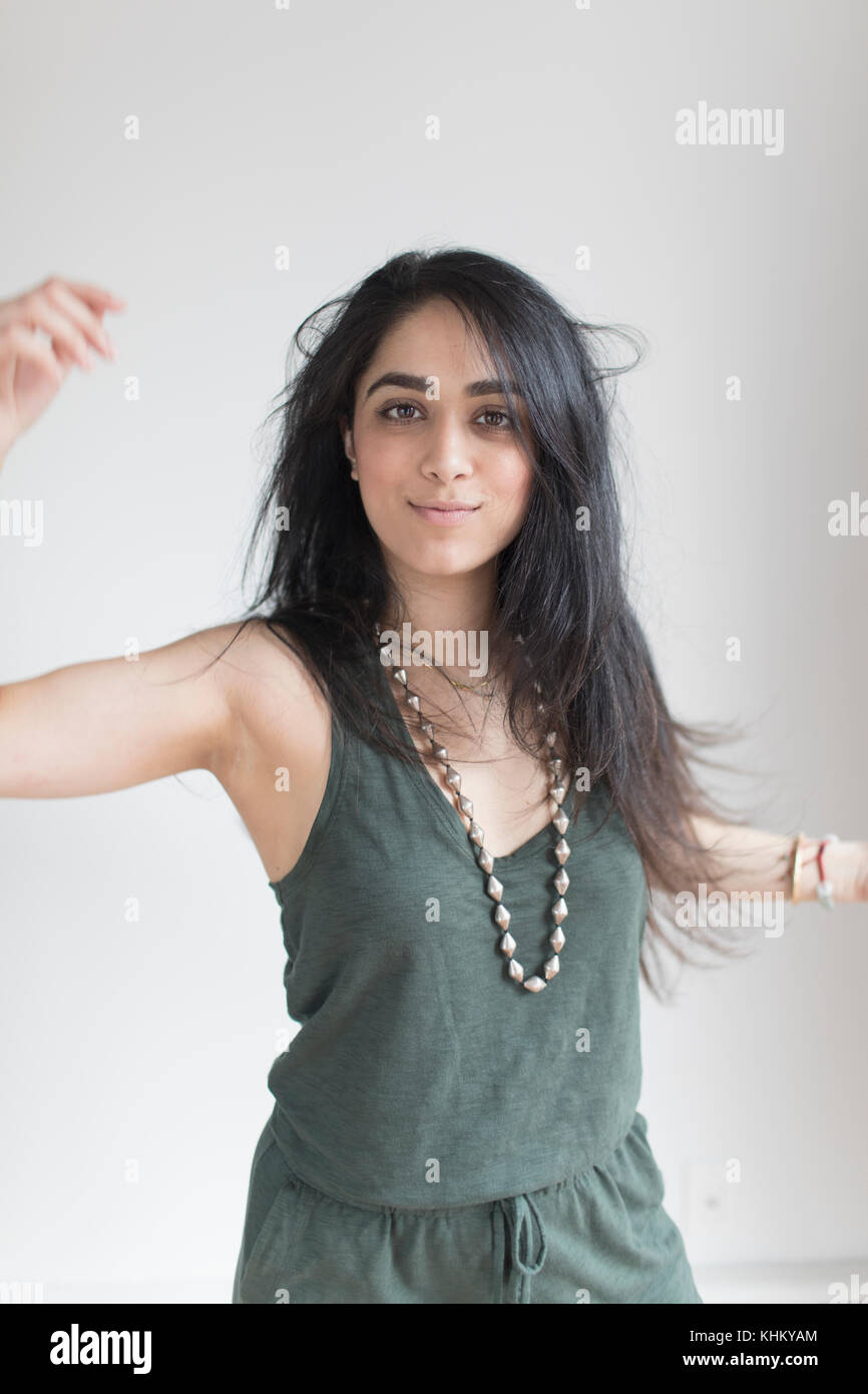 Young indian woman dancing white hi-res stock photography and images ...