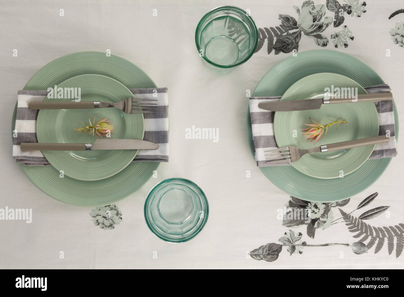 Overhead view of elegant table setting with glass Stock Photo - Alamy