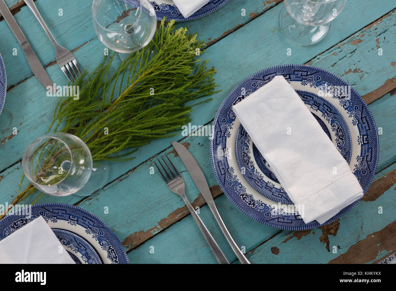 Overhead of table setting on weathered wooden plank Stock Photo - Alamy