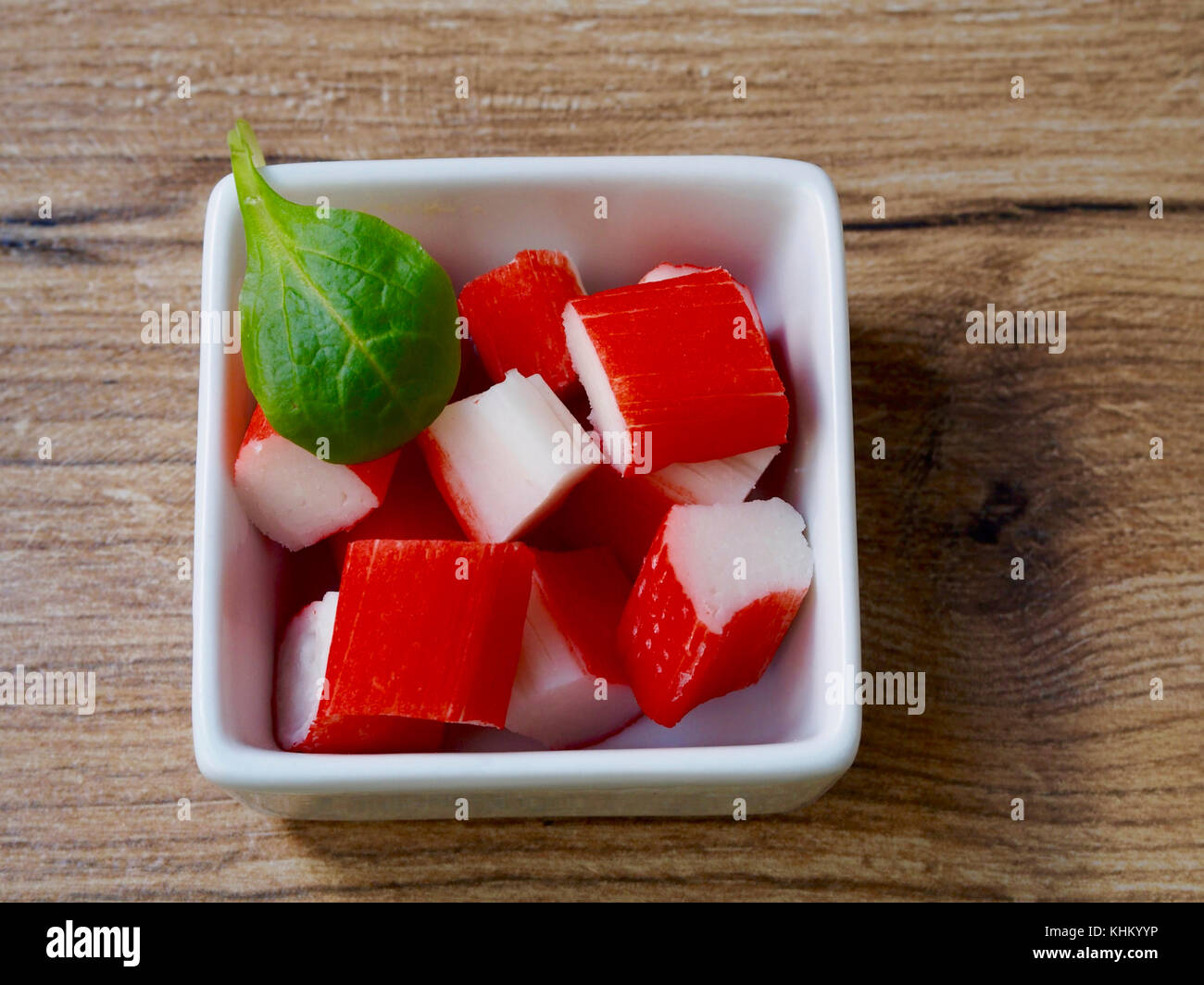 Surimi in a recipe on wood background Stock Photo - Alamy