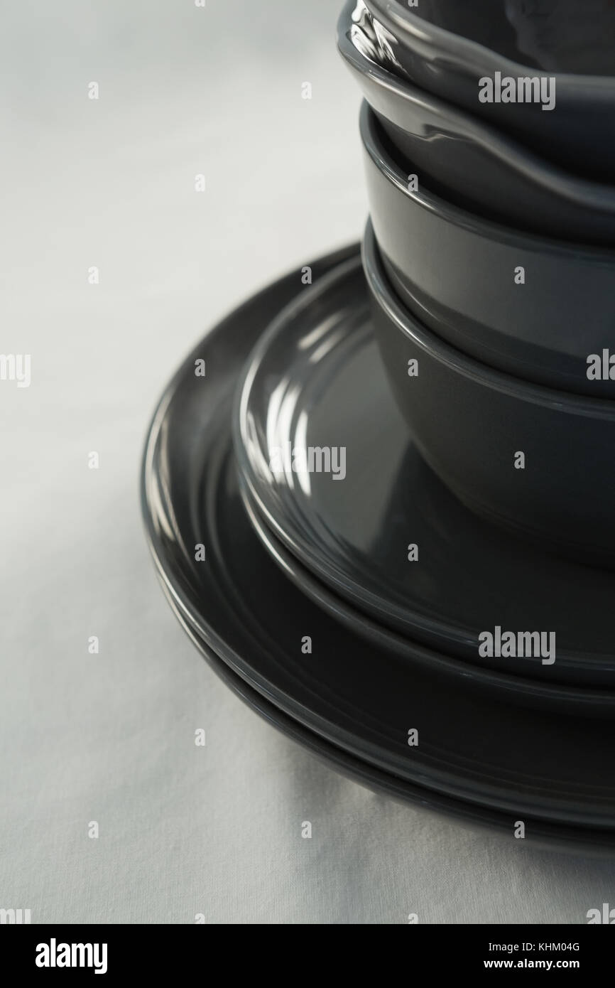 Close-up of plates and bowl set elegantly on a table Stock Photo - Alamy