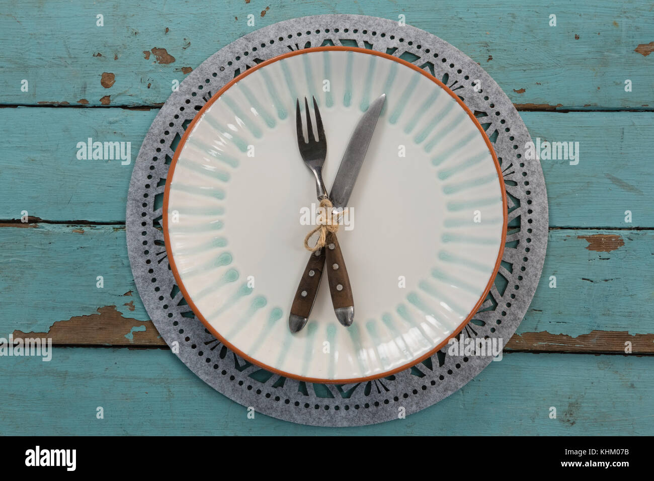 Overhead of table setting on weathered wooden plank Stock Photo - Alamy