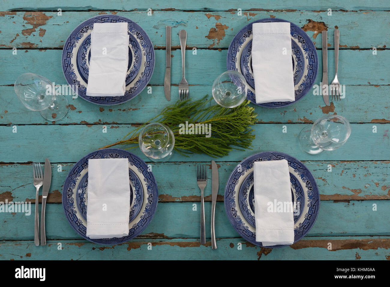 Overhead of table setting on weathered wooden plank Stock Photo - Alamy