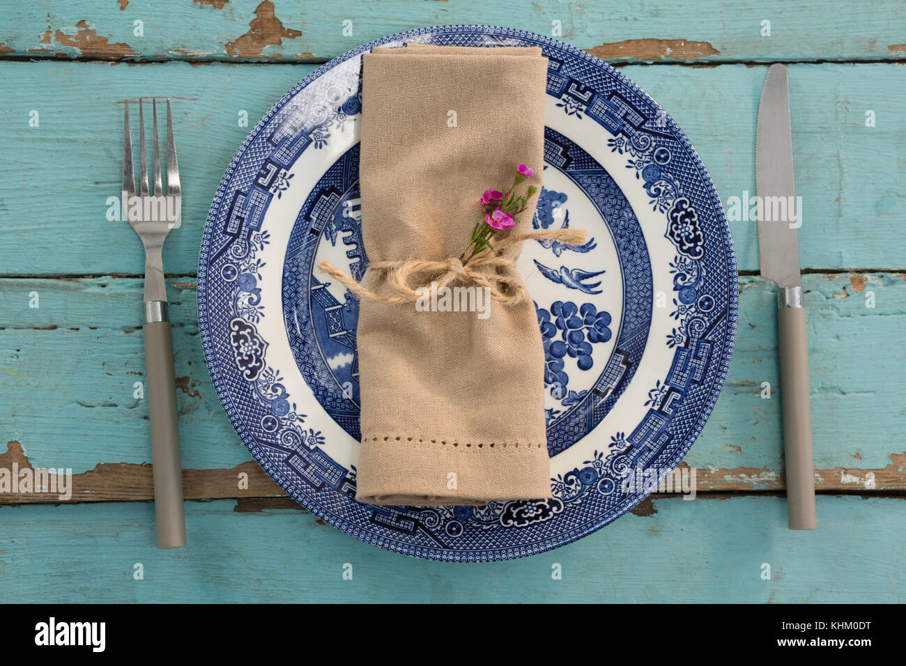 Overhead of table setting on weathered wooden plank Stock Photo - Alamy