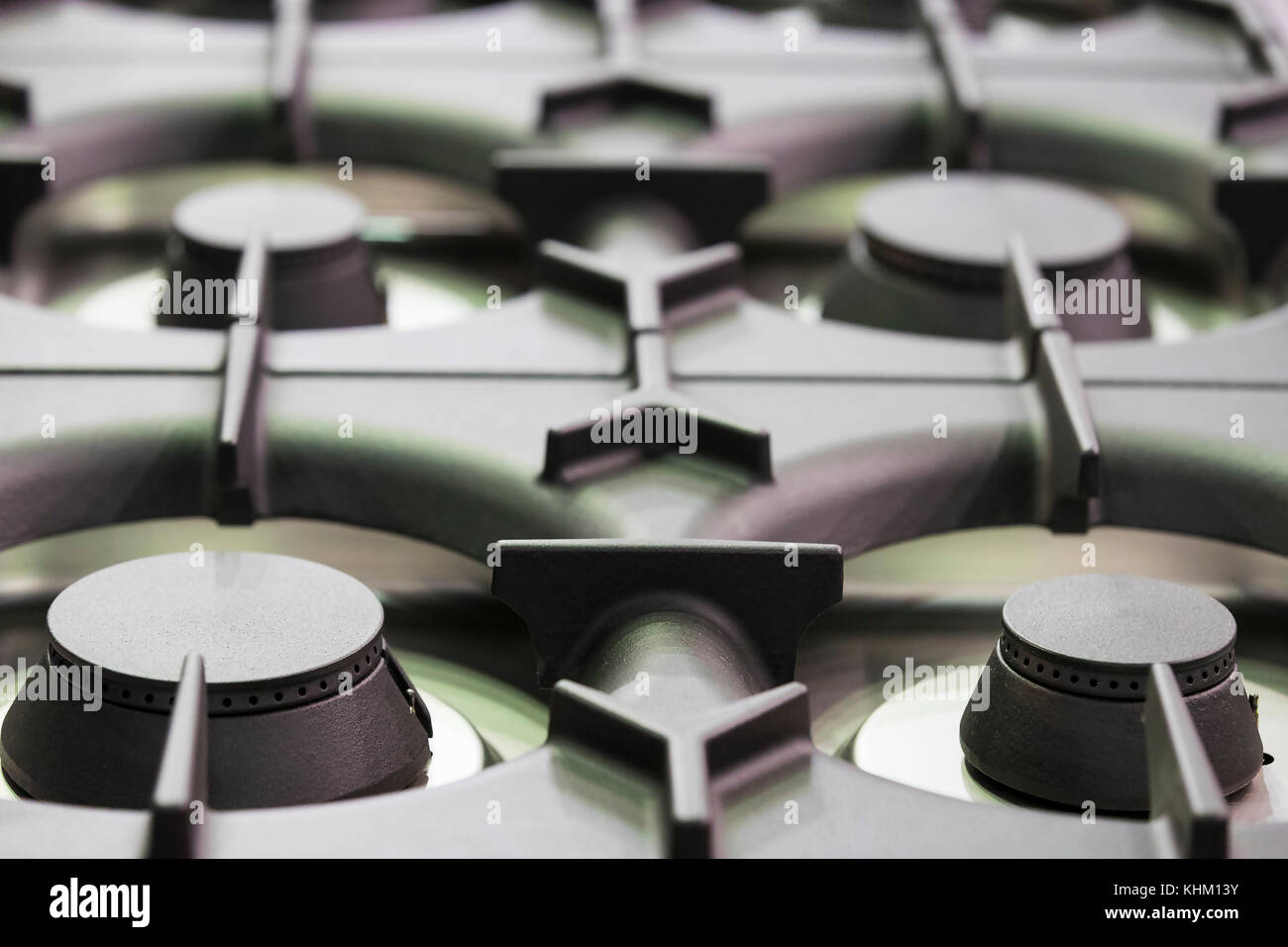 Burners metal gas hob surface plates are shot close-up Stock Photo - Alamy