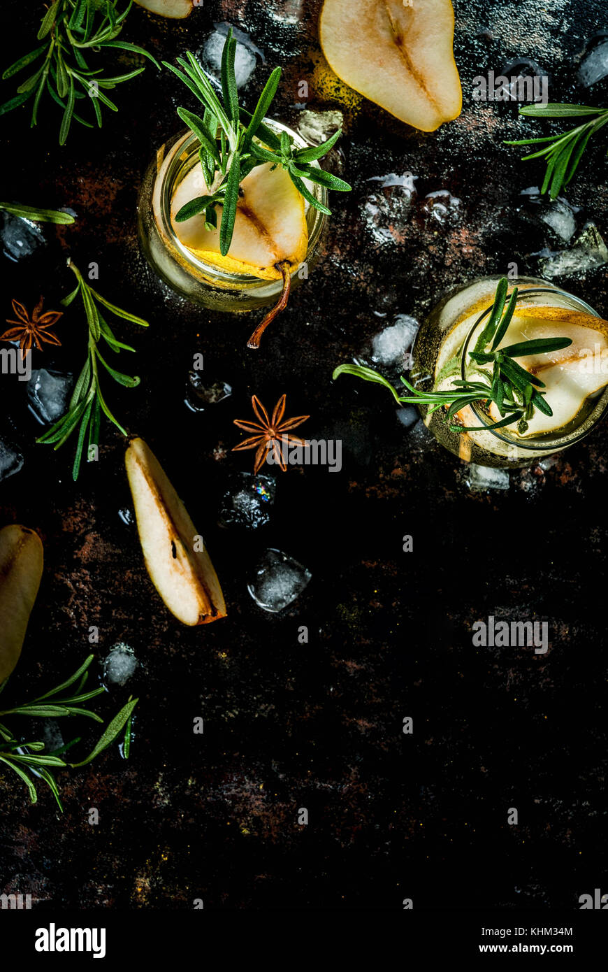 Alcohol drink, Sweet pear cocktail with rum, liquor, anise and rosemary ...