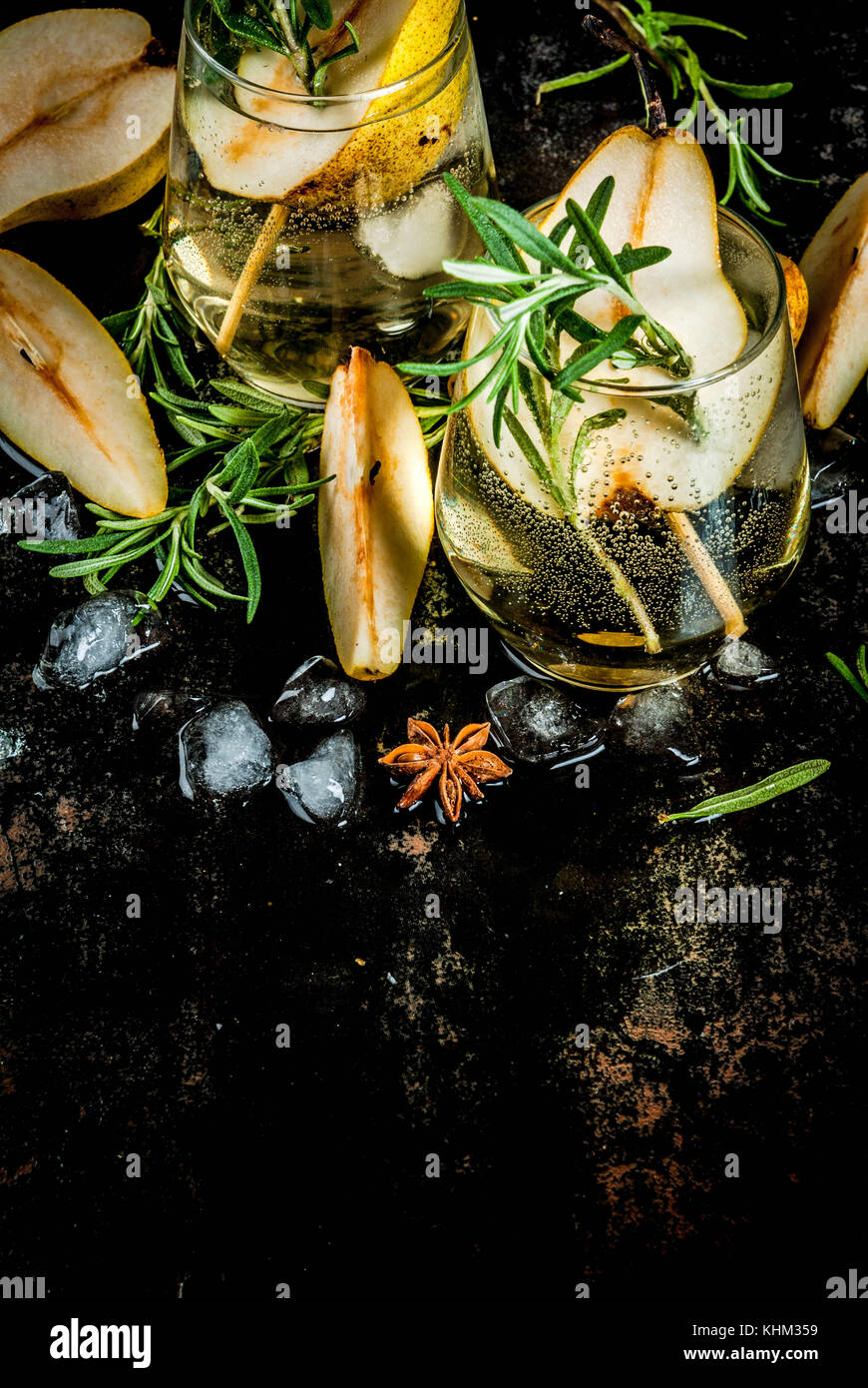 Alcohol drink, Sweet pear cocktail with rum, liquor, anise and rosemary ...