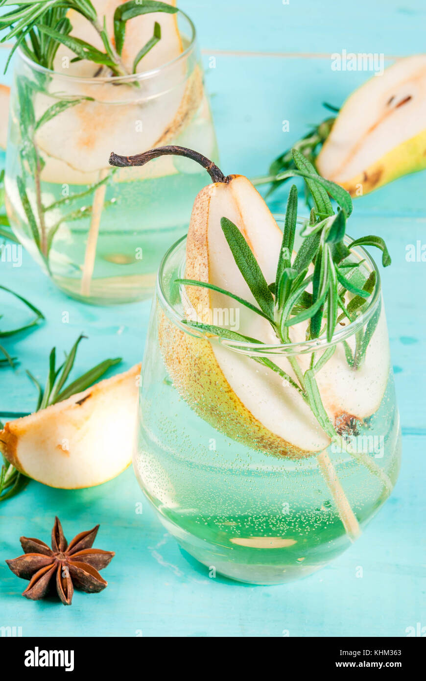Alcohol drink, Sweet pear cocktail with rum, liquor, anise and rosemary ...