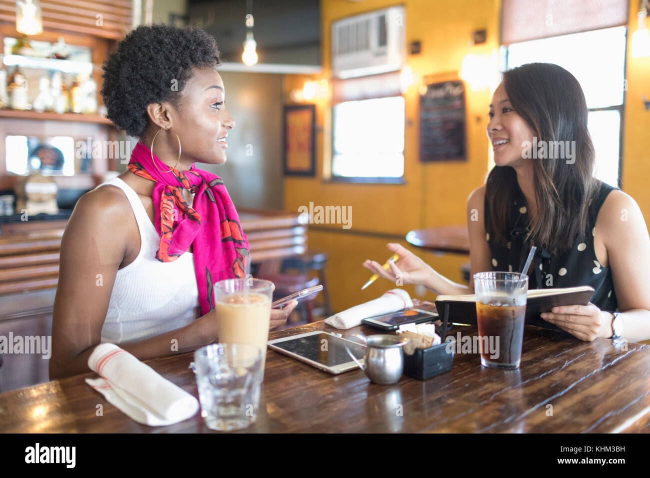 Friends having lunch together Stock Photo - Alamy