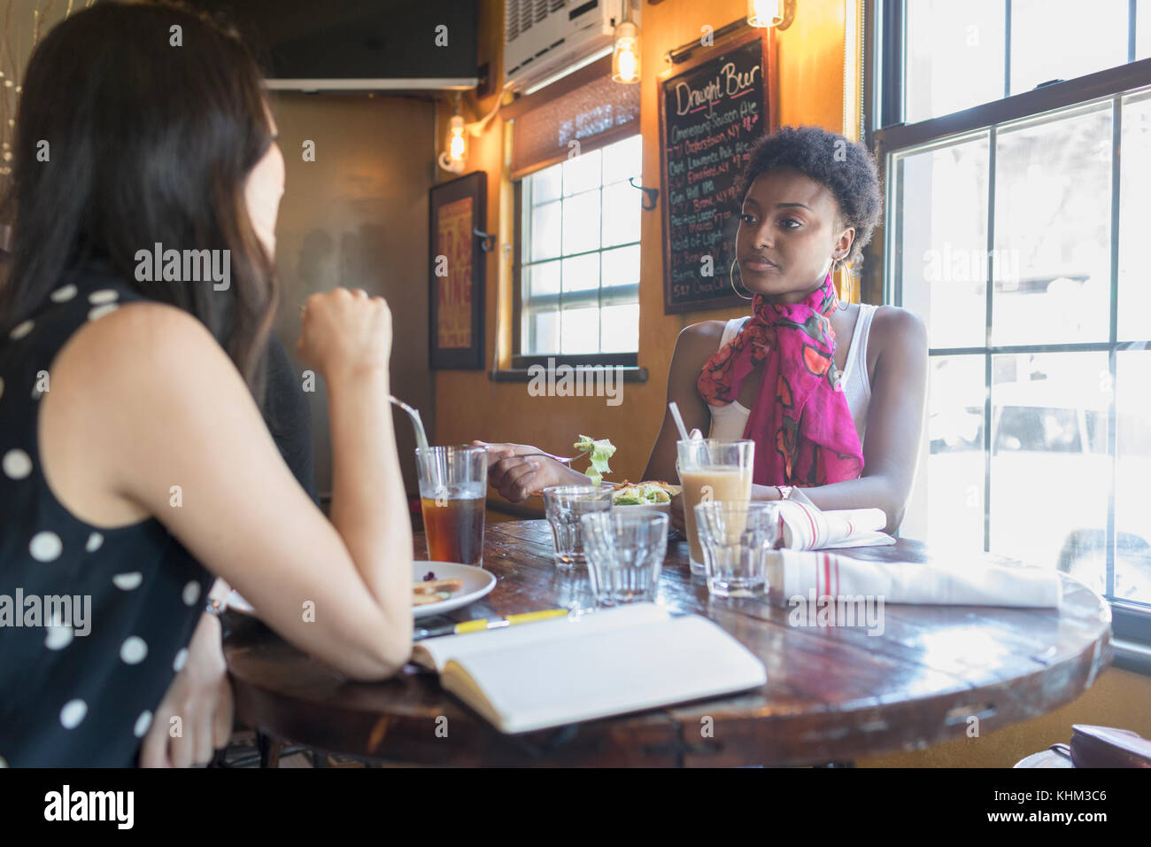 Friends having lunch together Stock Photo - Alamy