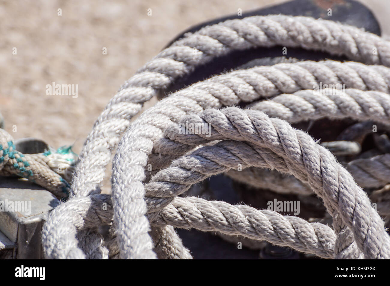 nautical rope rolled on the pier in a random way Stock Photo - Alamy
