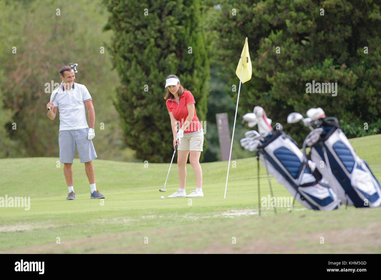 teaching to golf Stock Photo - Alamy