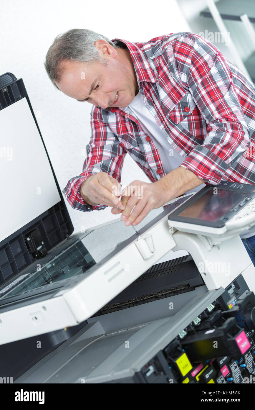 fixing the printer Stock Photo - Alamy
