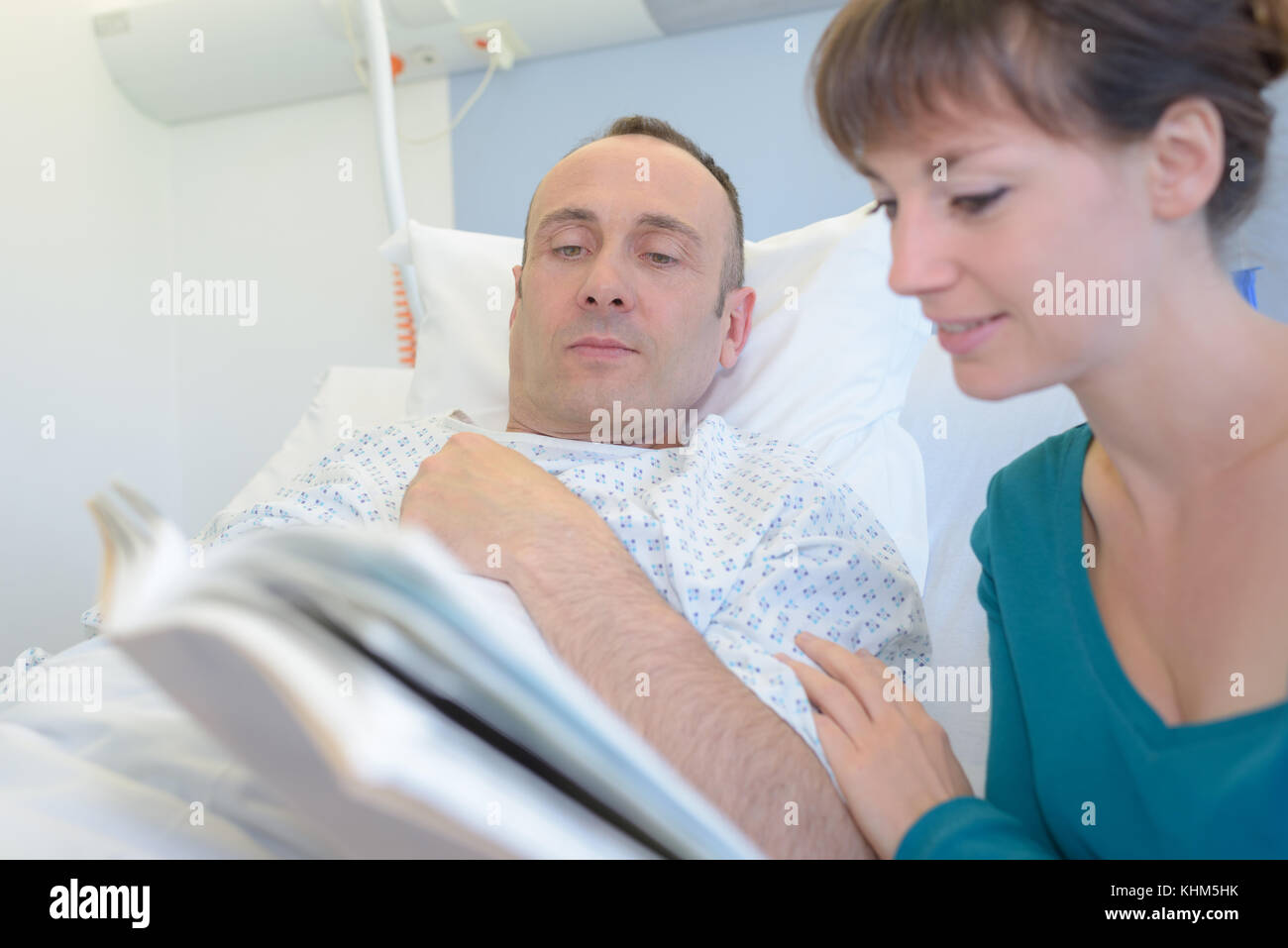 reading the patient a book Stock Photo - Alamy