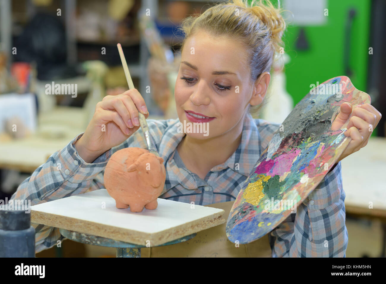 woman painting an object Stock Photo - Alamy