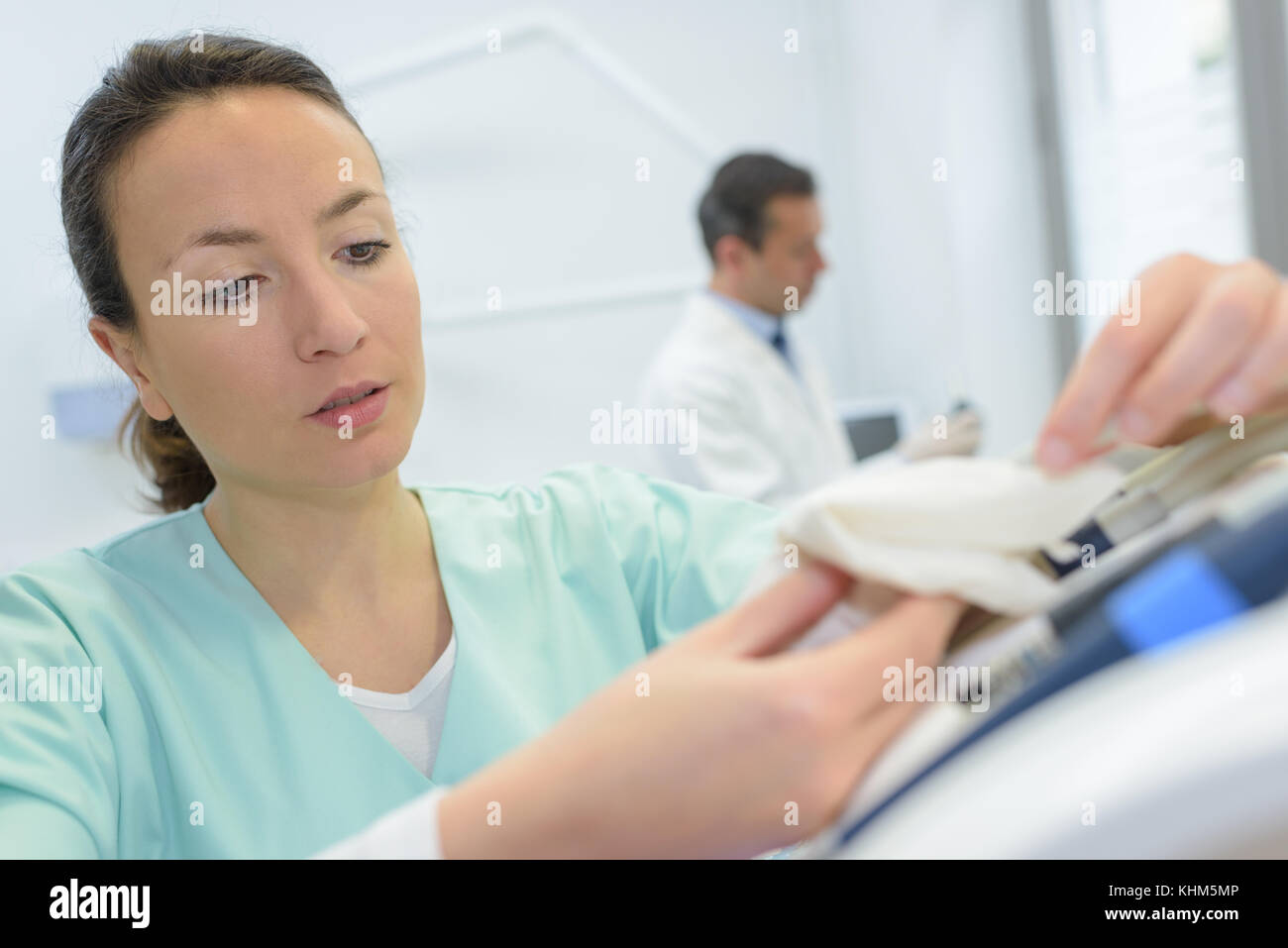 female nurse preparing injection with syringe in hospital Stock Photo ...