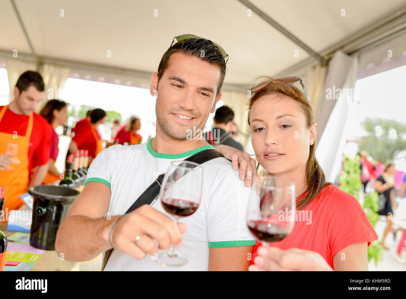Couple doing some wine tasting Stock Photo - Alamy