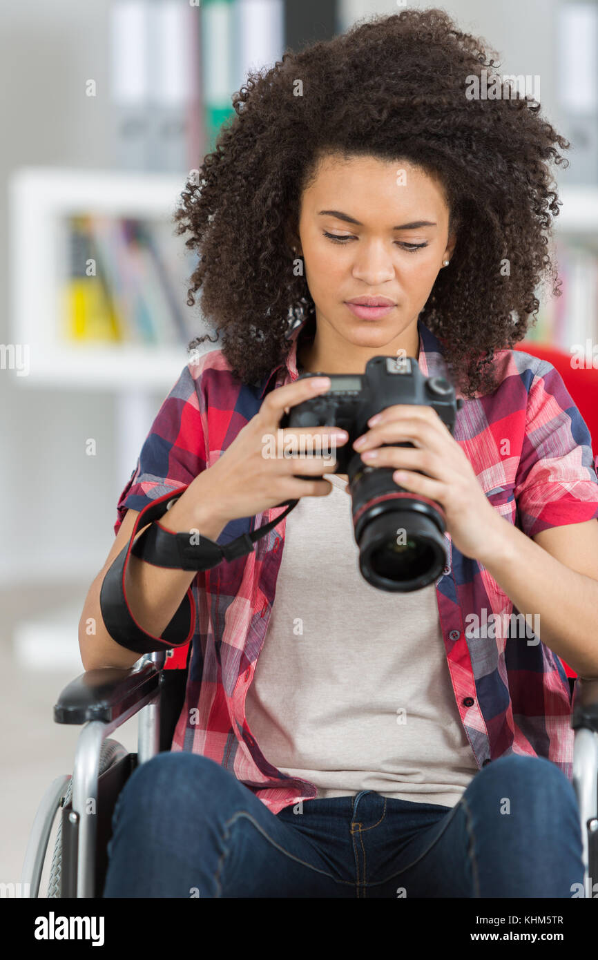 disabled woman discovering a passion for photography Stock Photo - Alamy