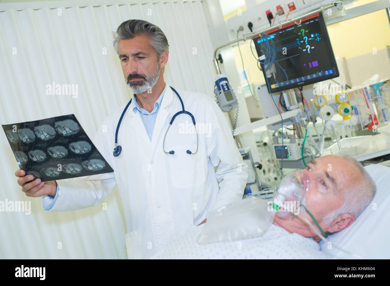 doctor inspecting the result Stock Photo - Alamy