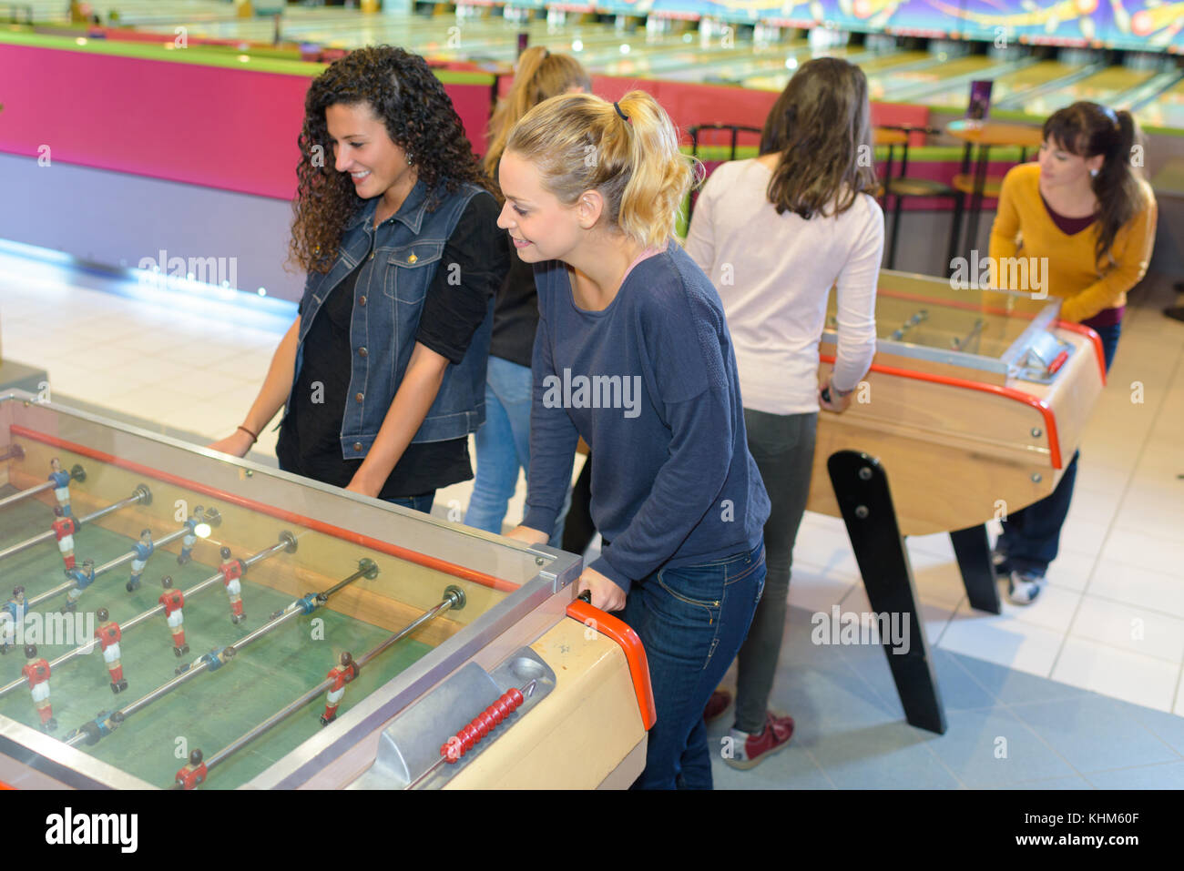 Women playing table football Stock Photo - Alamy