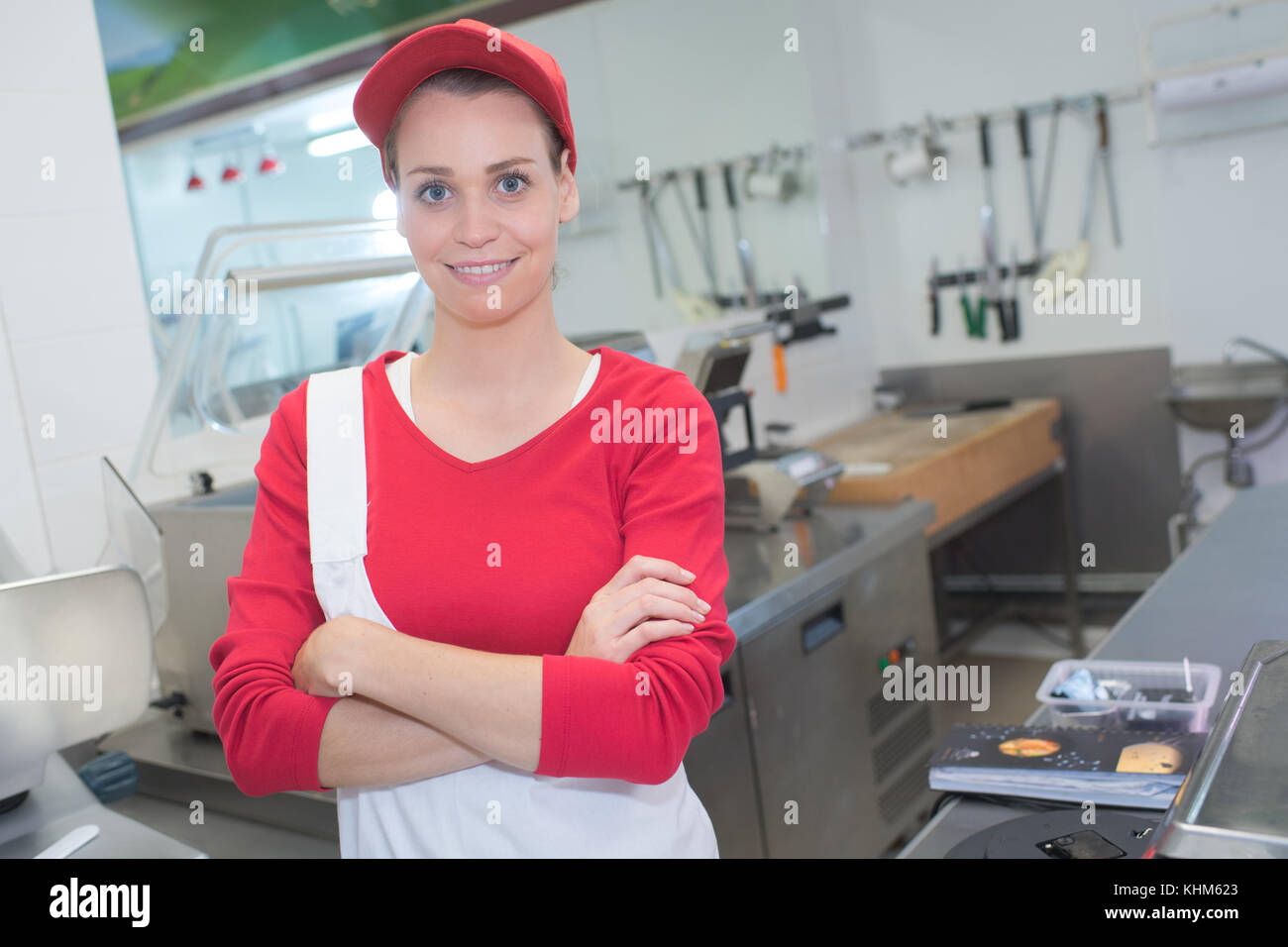 cheerful female butcher on supermarket Stock Photo - Alamy
