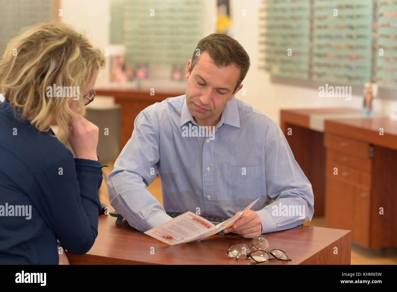 salesman with customer Stock Photo - Alamy