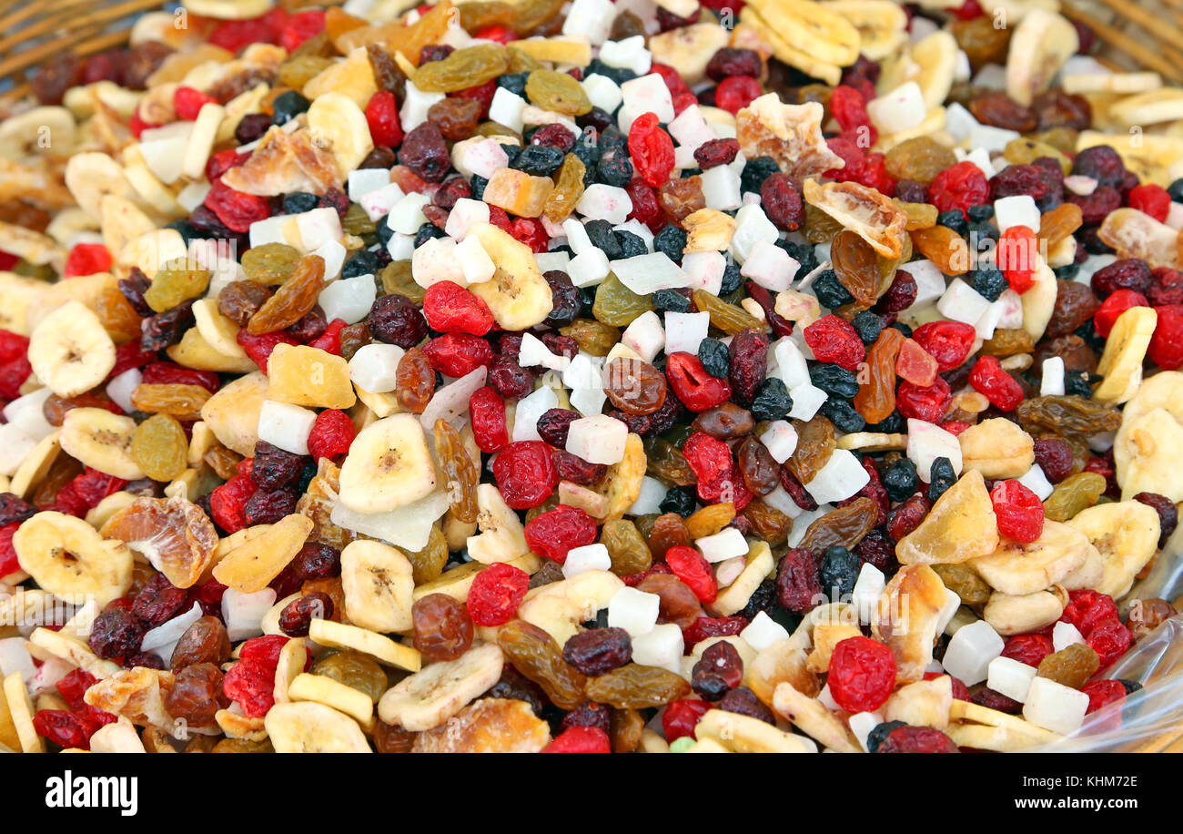 background of many dried fruits cherry banana cocco raisins Stock Photo ...