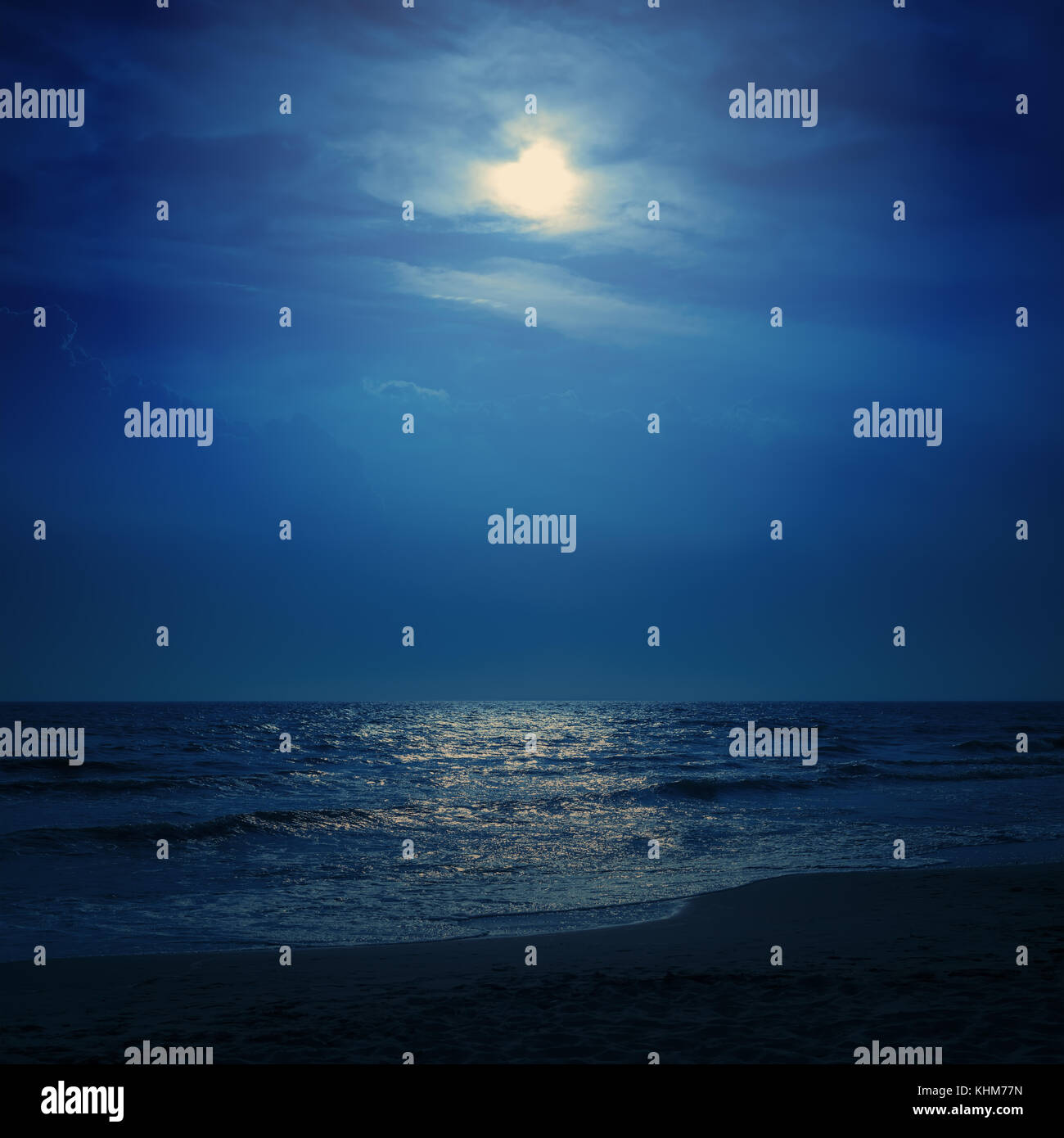 moon light in dark blue sky over sea Stock Photo - Alamy