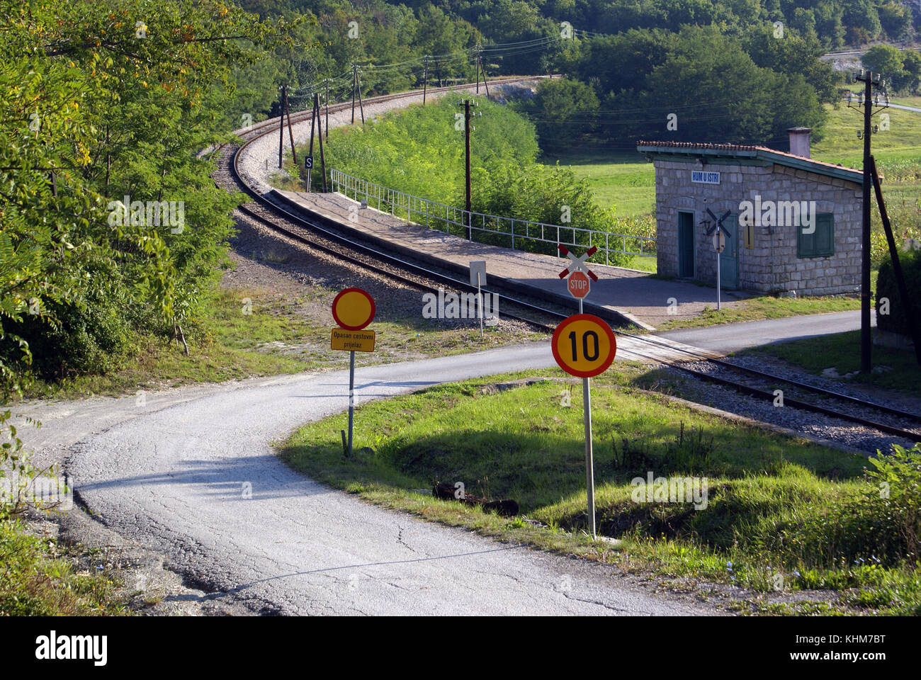 Crossroads road and railway Stock Photo - Alamy
