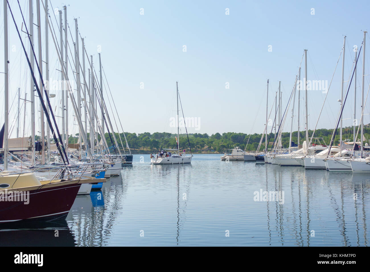 Sailboat leaving harbor yachts hi-res stock photography and images - Alamy